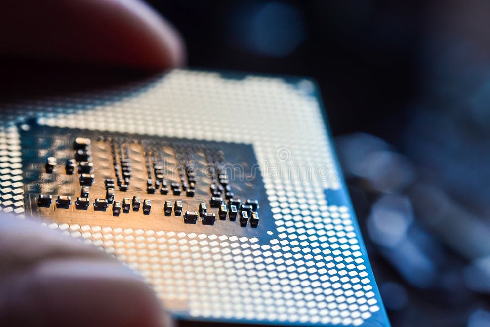 Computer CPU Processor Micro Chip between Fingers Close Up Stock Image ...