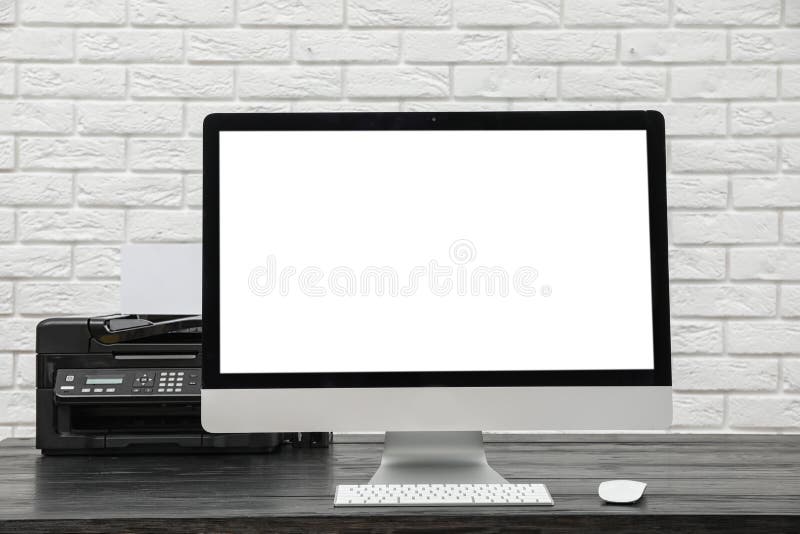 Computer on Desk Against Brick Wall Stock Image - Image of comfortable ...