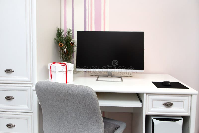 Computer on a Desktop with a Gift Box. Place for Text, Work and Holiday ...