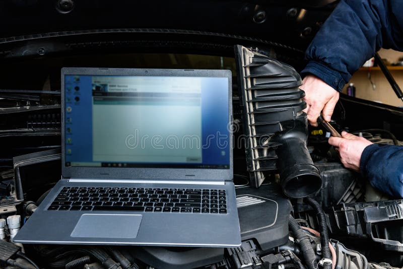 Computer Diagnostics of the Car in Garage. Stock Image - Image of ...