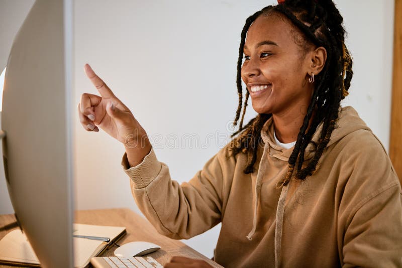 Computer, Education and Research with a Student Black Woman Pointing at ...