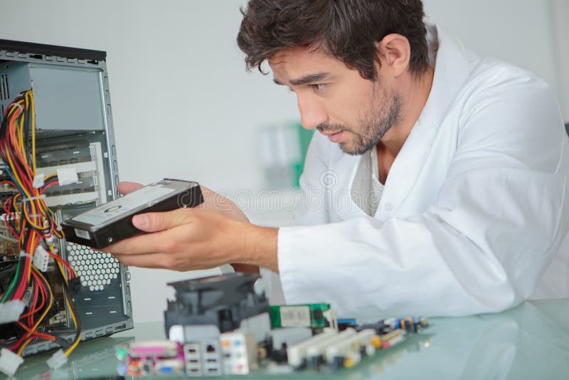 Computer Engineer Installing Hard Drive Stock Image - Image of ... Computer Engineer Installing Hard Drive Stock Image - Image of ...