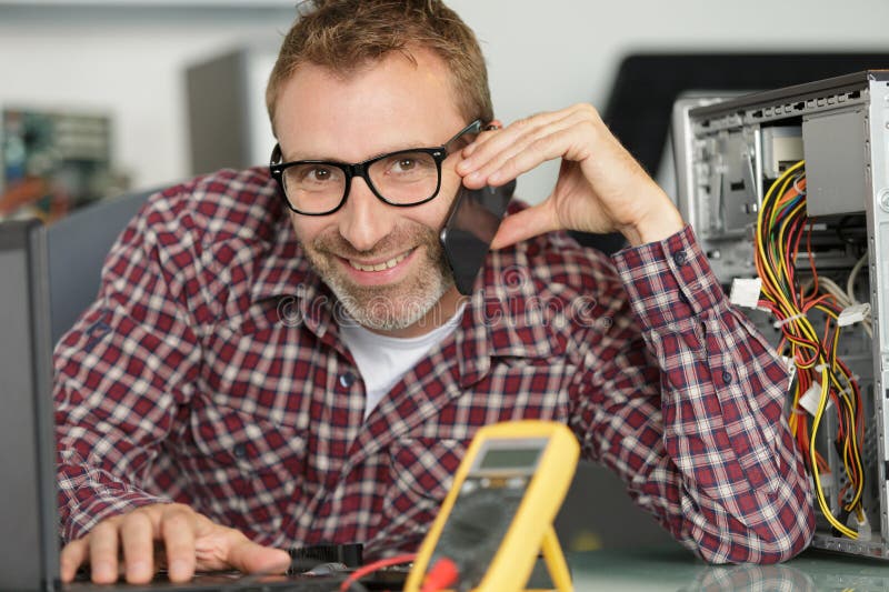Computer Engineer on Phone Repairing Broken Desktop Stock Photo - Image ...