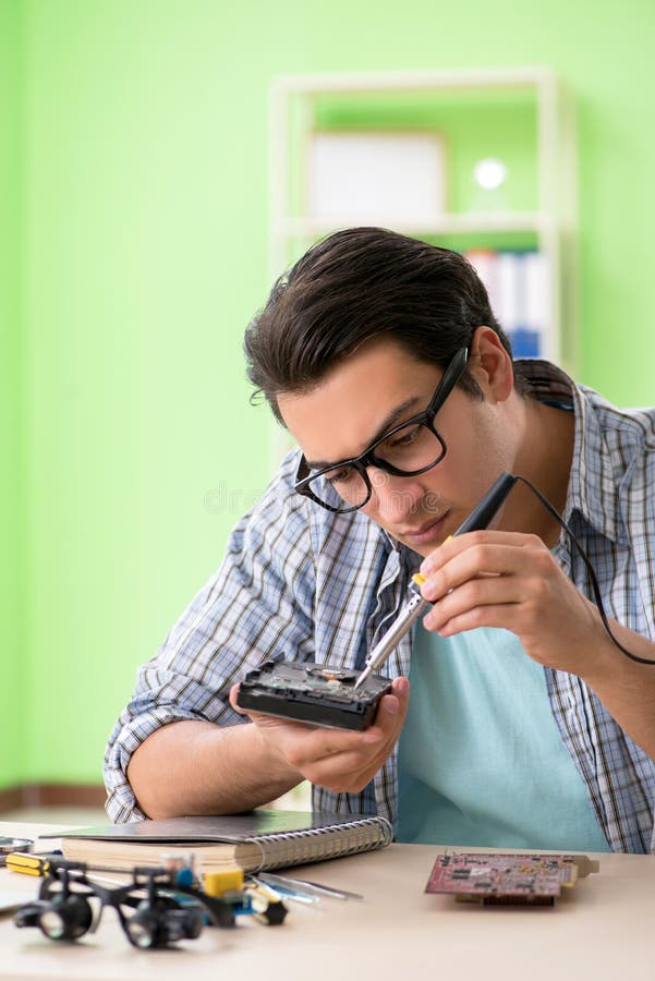 The Computer Engineer Repairing Broken Desktop Stock Photo - Image of ...