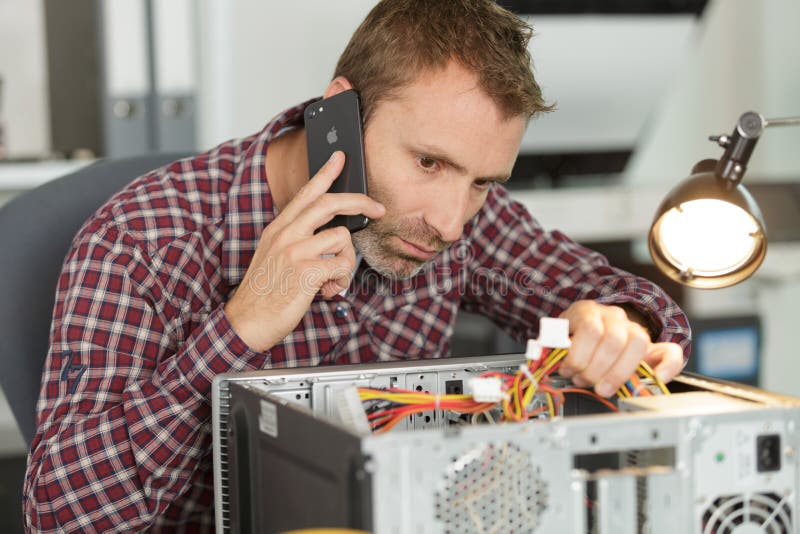 Computer Engineer Repairing Broken Desktop on Phone Stock Photo - Image ...