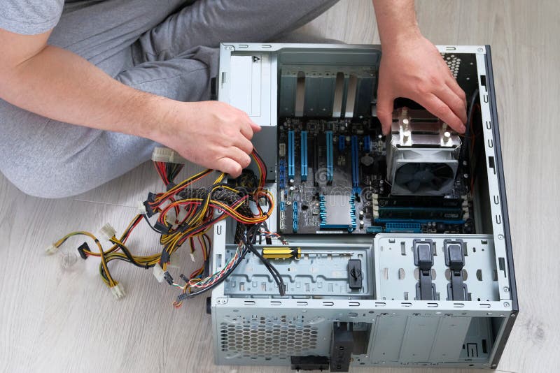 Computer Engineer is Repairing CPU. Service Electronics and Computers ...