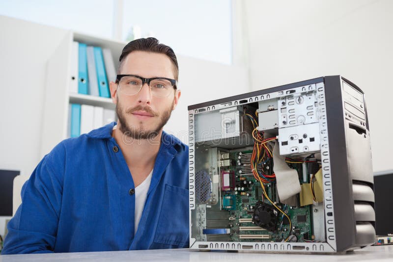 Computer Engineer Smiling at Camera beside Open Console Stock Image ...
