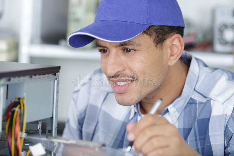 Computer Engineer Working on Broken Console Stock Image - Image of ...