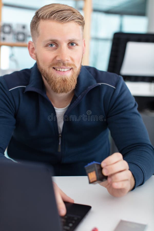 Computer Engineer Working on Broken Computer in Office Stock Photo ...