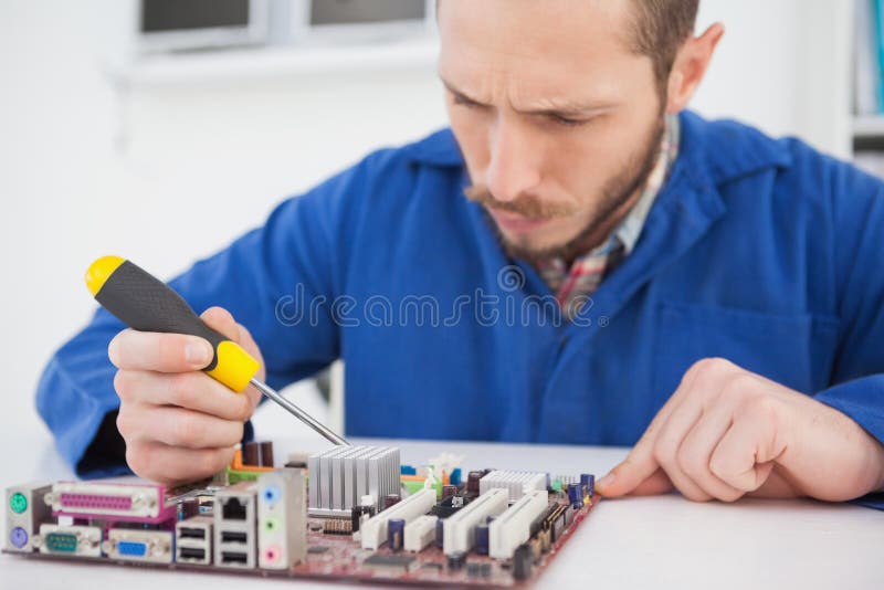 Computer Engineer Working on Cpu with Screwdriver Stock Image - Image ...