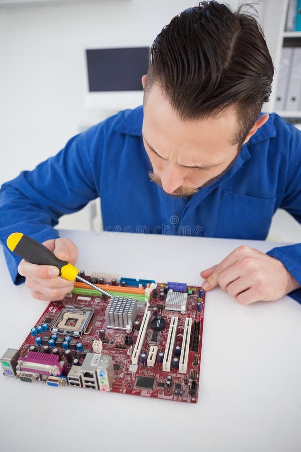 Computer Engineer Working on Cpu with Screwdriver Stock Photo - Image ...