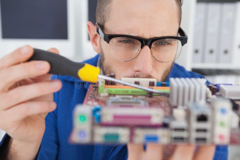 Computer Engineer Working on Cpu with Screwdriver Stock Photo - Image ...