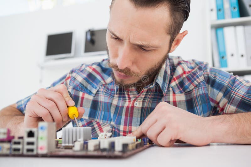 Computer Engineer Working on Cpu with Screwdriver Stock Photo - Image ...