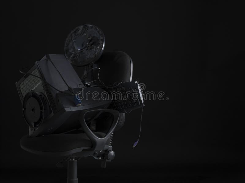 Computer Equipment and Fan on Office Chair Stock Image - Image of black ...