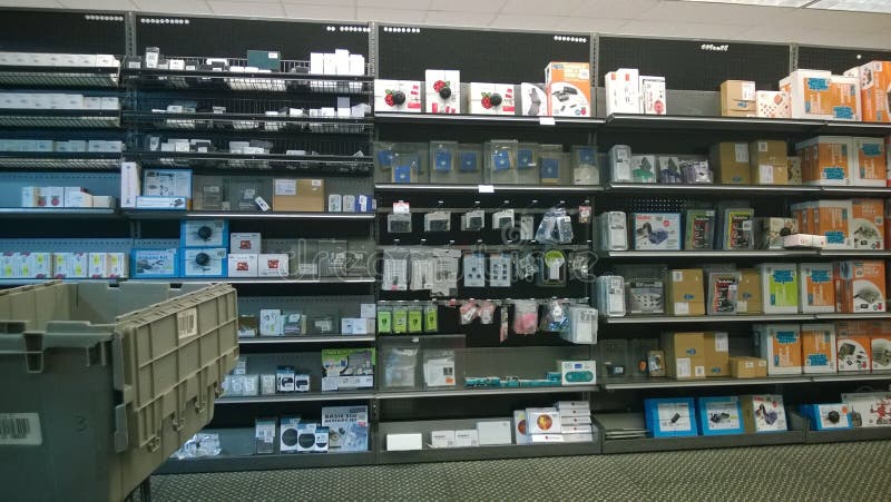 Computer Equipment on Shelves Editorial Photo - Image of selling ...