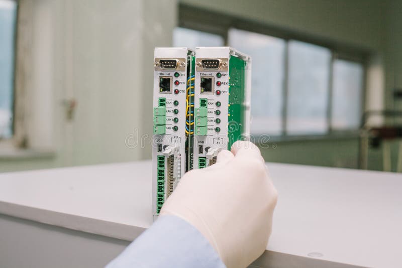 Computer Expert Professional Technician Examining Board Computer in a ...