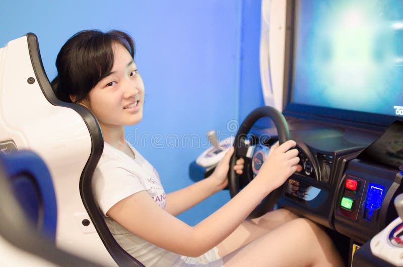 Girl in the arcade game stock photo. Image of childhood - 59138534