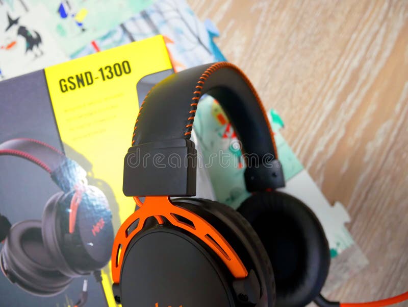 Computer Gaming Table. Headphones with Microphone for Gamers Editorial ...