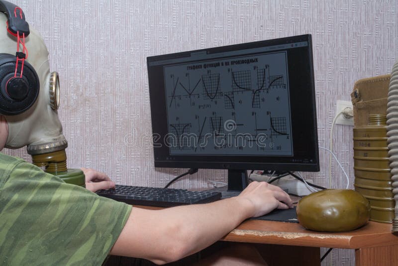At the Computer in a Gas Mask in a Nuclear Explosion. Concept of ...