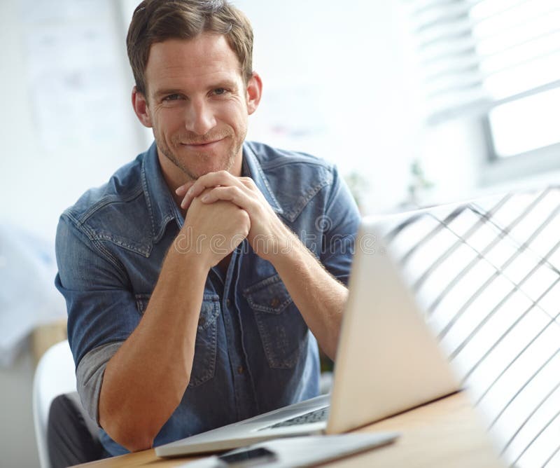 Computer Genius To Your Rescue. a Young Man Sitting at His Desk while ...