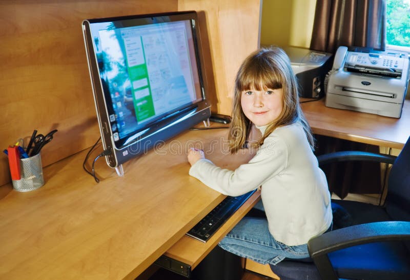 Computer girl stock image. Image of sitting, child, casual - 10103625