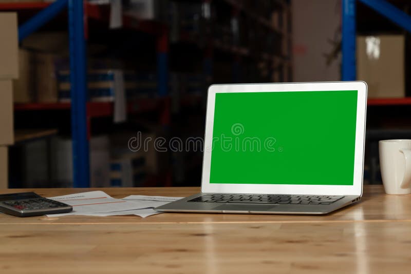 Computer with Green Screen Display in Warehouse Storage Room Stock ...
