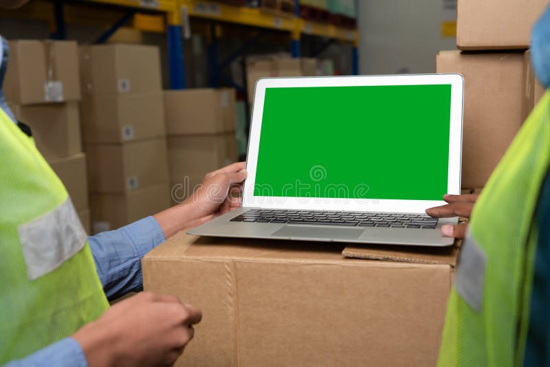 Computer with Green Screen Display in Warehouse Storage Room Stock ...