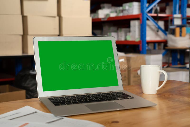 Computer with Green Screen Display in Warehouse Storage Room Stock ...