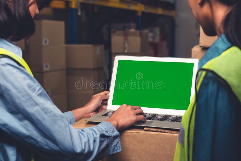 Computer with Green Screen Display in Warehouse Storage Room Stock ...