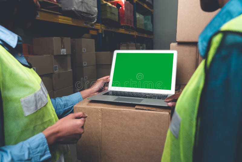 Computer with Green Screen Display in Warehouse Storage Room Stock ...