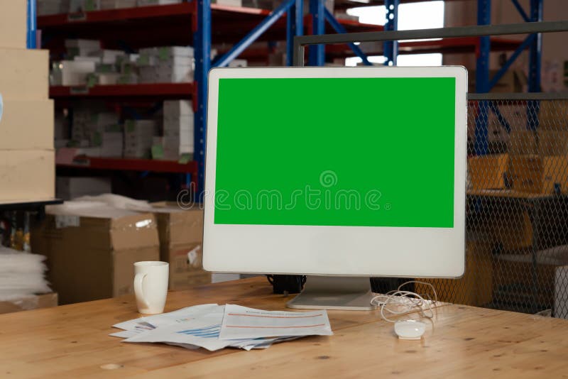 Computer with Green Screen Display in Warehouse Storage Room Stock ...