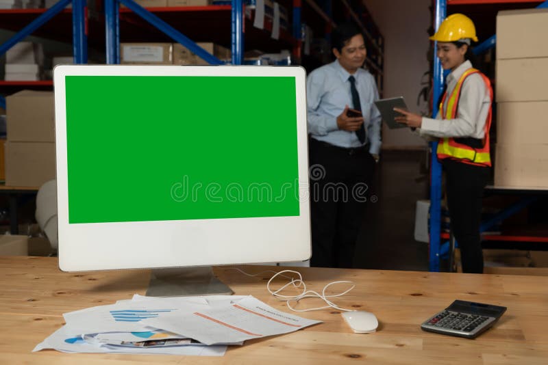 Computer with Green Screen Display in Warehouse Storage Room Stock ...