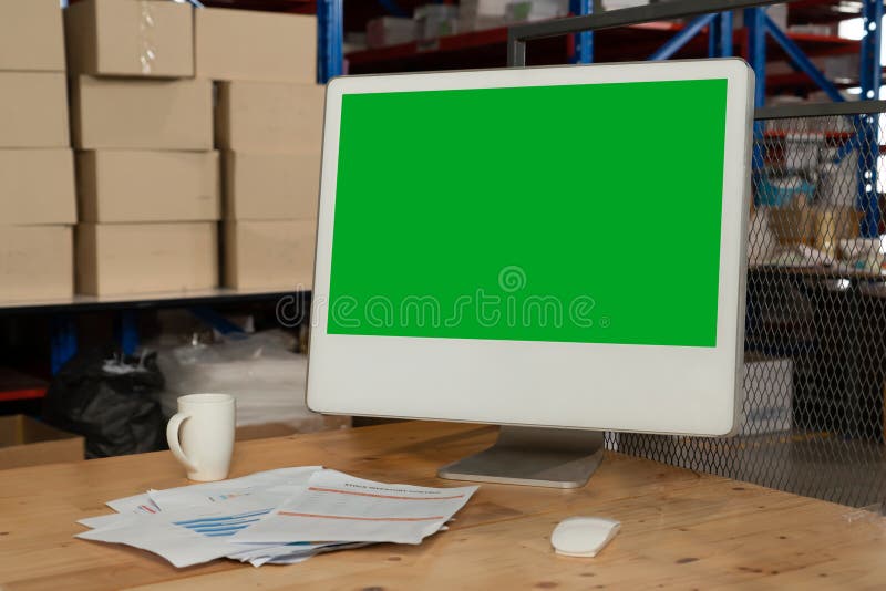Computer with Green Screen Display in Warehouse Storage Room Stock ...