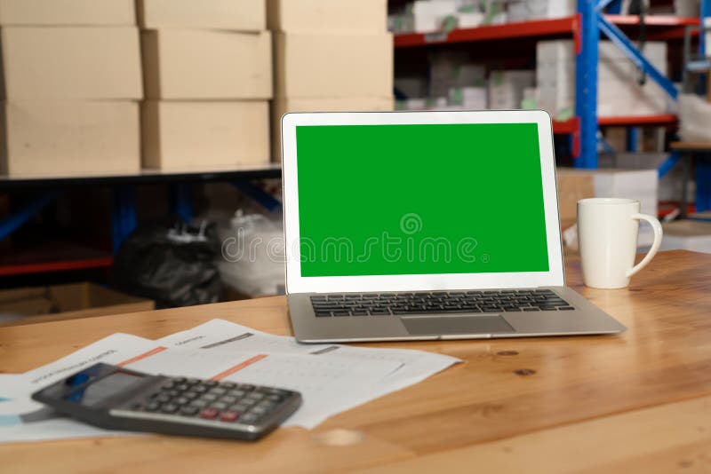 Computer with Green Screen Display in Warehouse Storage Room Stock ...