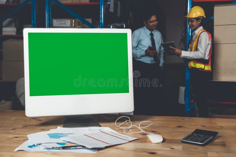 Computer with Green Screen Display in Warehouse Storage Room Stock ...