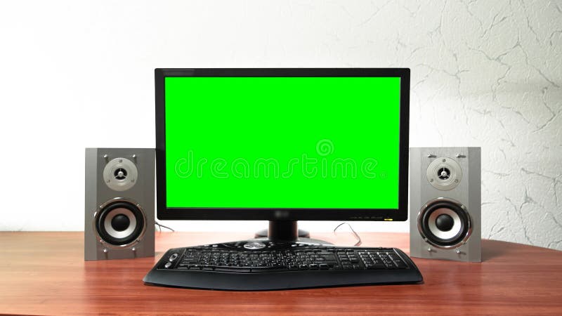 Computer Green Screen Monitor is Standing on a Desk in an Office ...