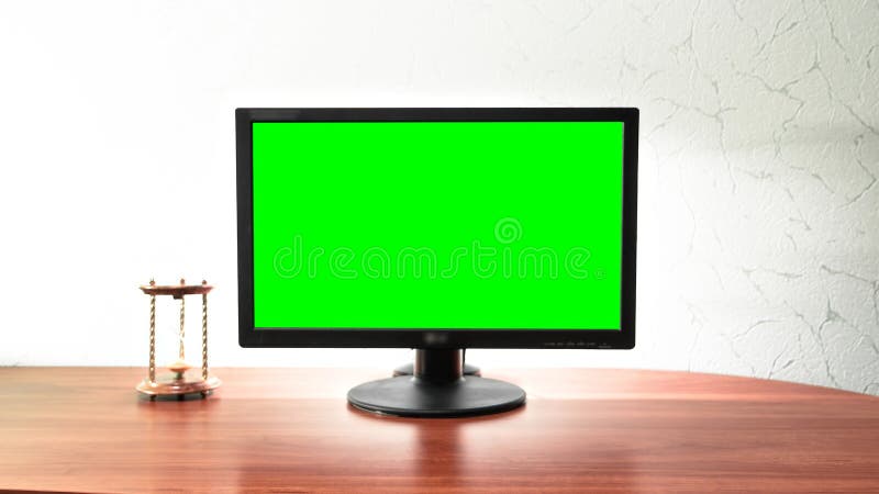 Computer Green Screen Monitor is Standing on a Desk in an Office ...
