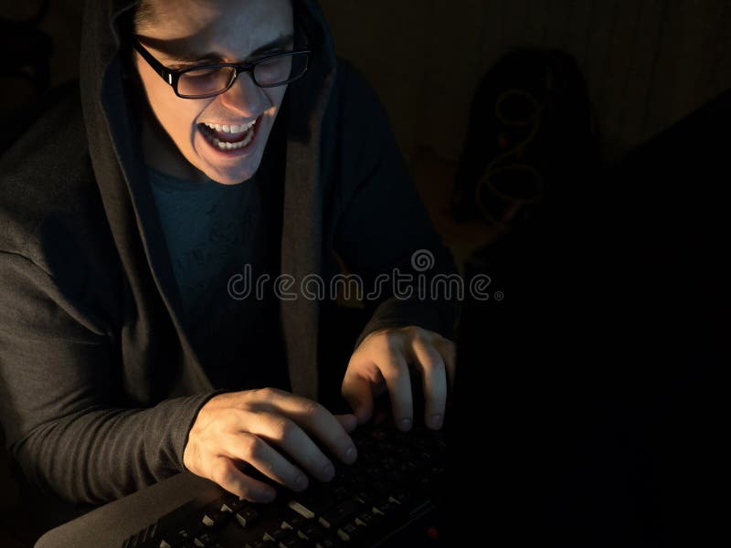 Computer Hacker Man Stealing Information with Laptop Stock Photo ...