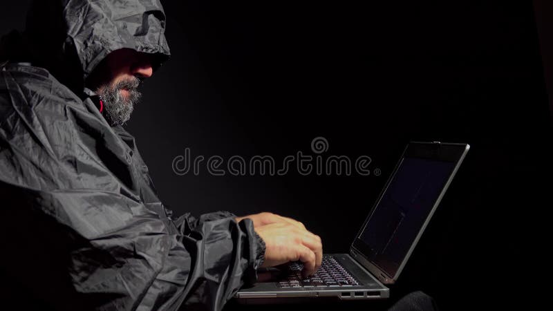 Computer Hacker Stealing Data from a Laptop Stock Video - Video of ...