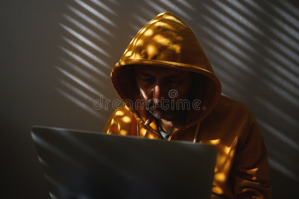 Computer Hacker Wearing Yellow Hoodie Using Laptop Stock Image - Image ...