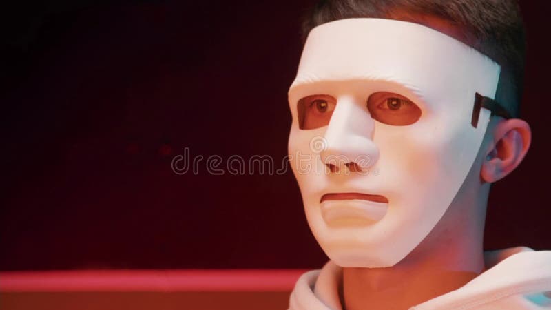 Close-up of a Masked Hacker Hacking a Database on a Computer, Hacking ...