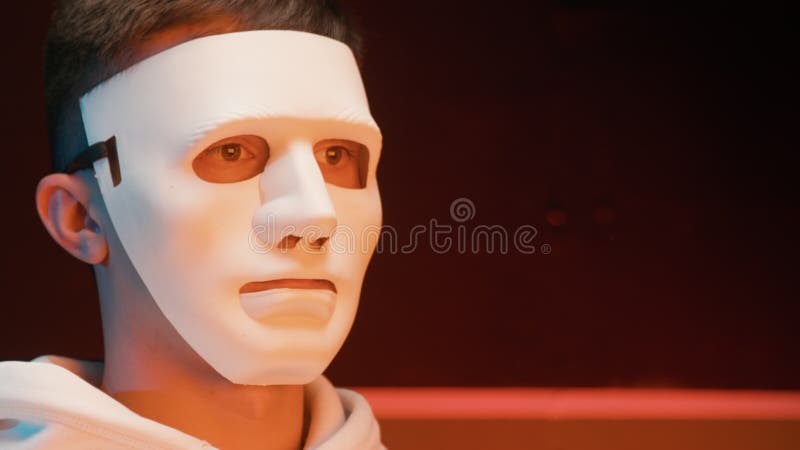 A Masked Hacker Breaks into a Database on a Computer, Hacking in a Dark Room Close-up Stock ...