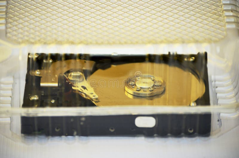 Computer Hard Disc into Transparent Plastic Container Stock Image ...