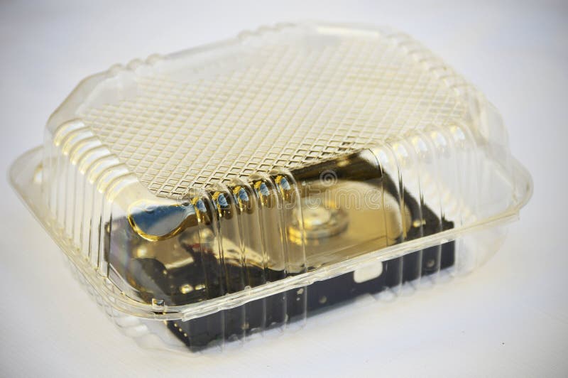 Computer Hard Disc into Transparent Plastic Container Stock Image ...