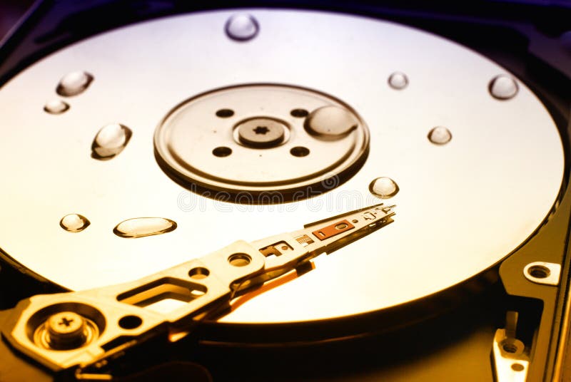 Computer Hard Drive with Reading Head and Water Drops on it Stock Photo ...