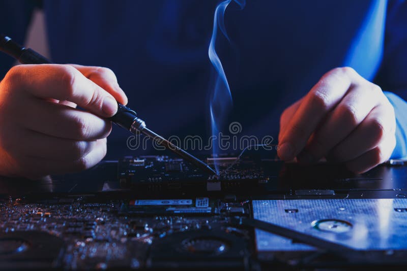 Computer Hardware Engineering. Developer Soldering Electronic Component ...