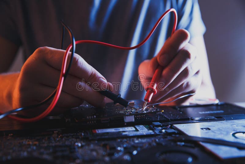 Computer Hardware Engineering. Developer Soldering Electronic Component ...