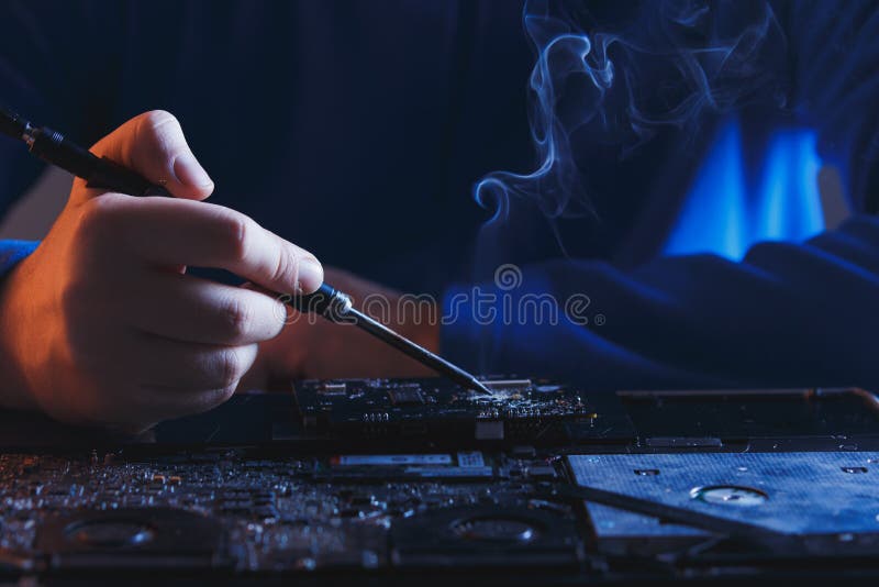 Computer Hardware Engineering. Developer Soldering Electronic Component ...
