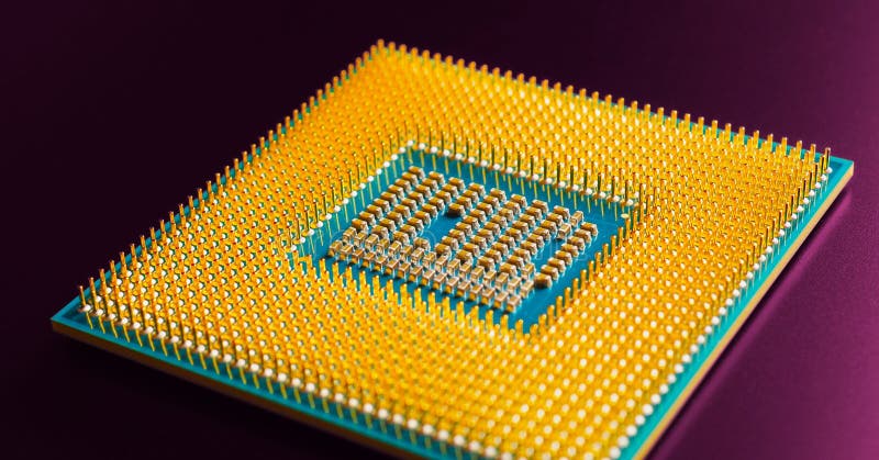 Computer Hardware. Processor Lies on Dark Purple Glass Surface. Closeup ...