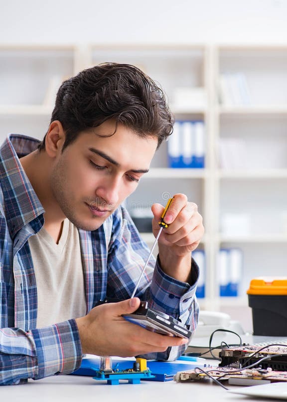 Computer Hardware Repair and Fixing Concept by Experienced Techn Stock ...